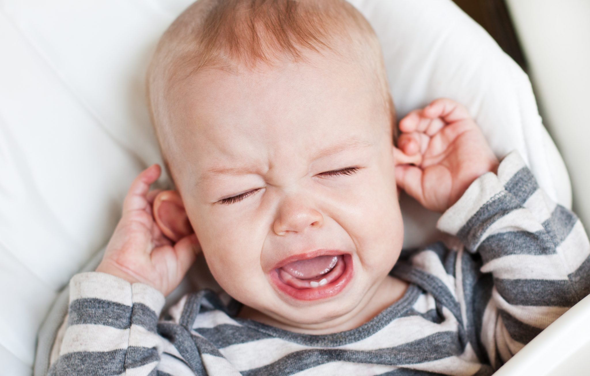 Baby Grinding Teeth: Causes, Symptoms & Solutions